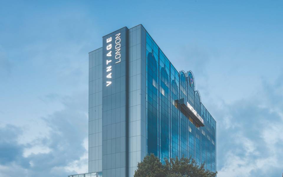Resolution hoists for-sale sign over Vantage London - Green Street News